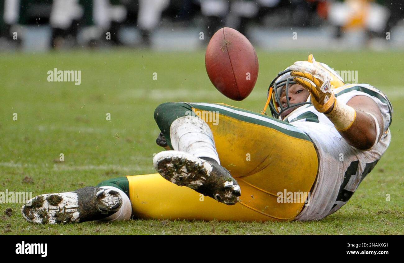 Green Bay Packers inside linebacker Desmond Bishop can't hold on to an ...
