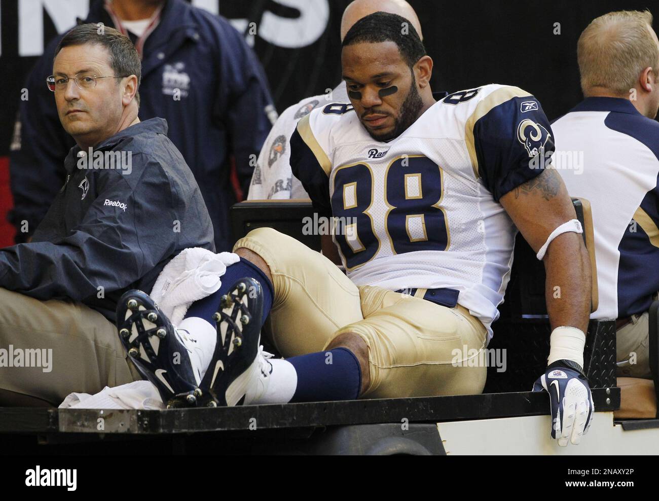 St. Louis Rams' Lance Kendricks (88) gets carted off the field due to ...