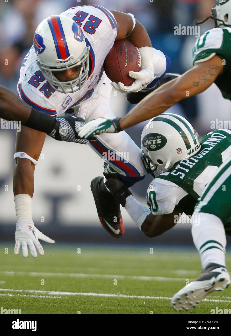Buffalo Bills' Fred Jackson (22) is tackled by New York Jets' Donald ...