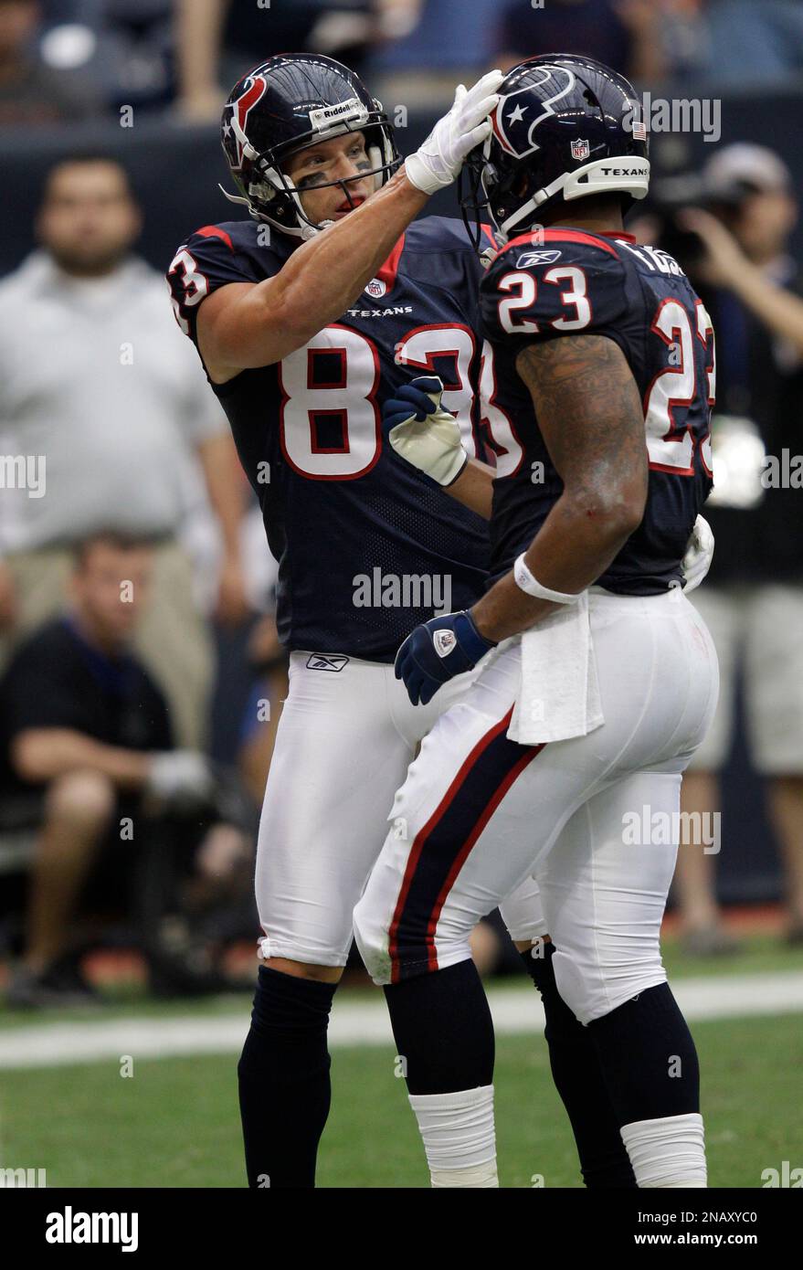 Houston Texans wide receiver Kevin Walter (83) and Arian Foster (23) in ...