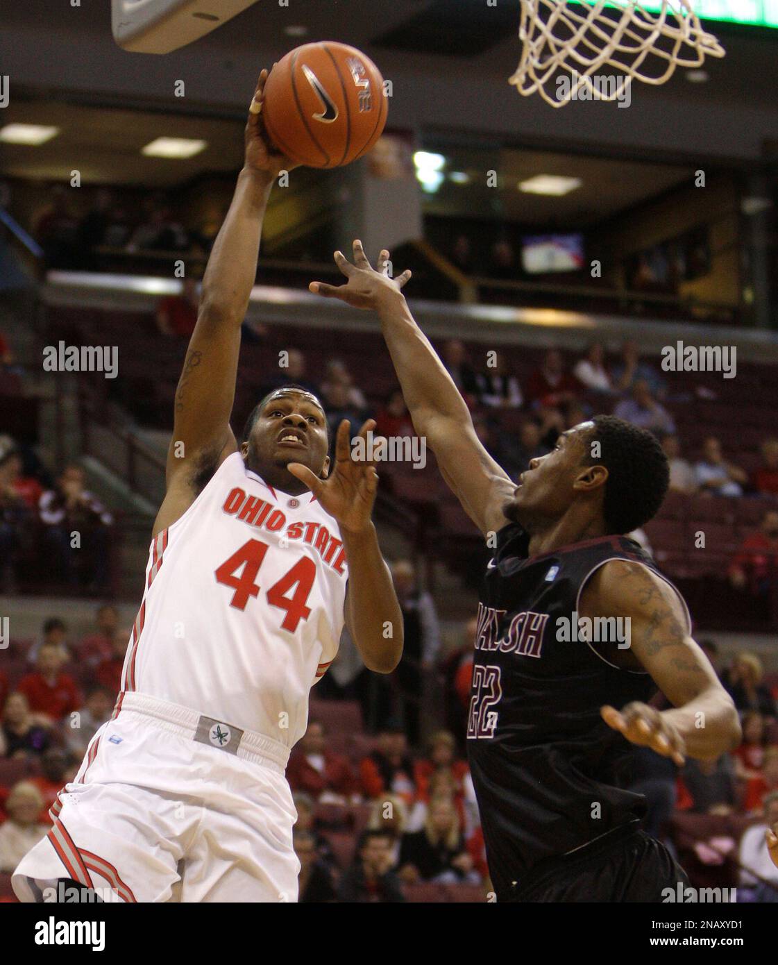 Ohio State's William Buford (44) shoots over Walsh's Ron Kinney during ...