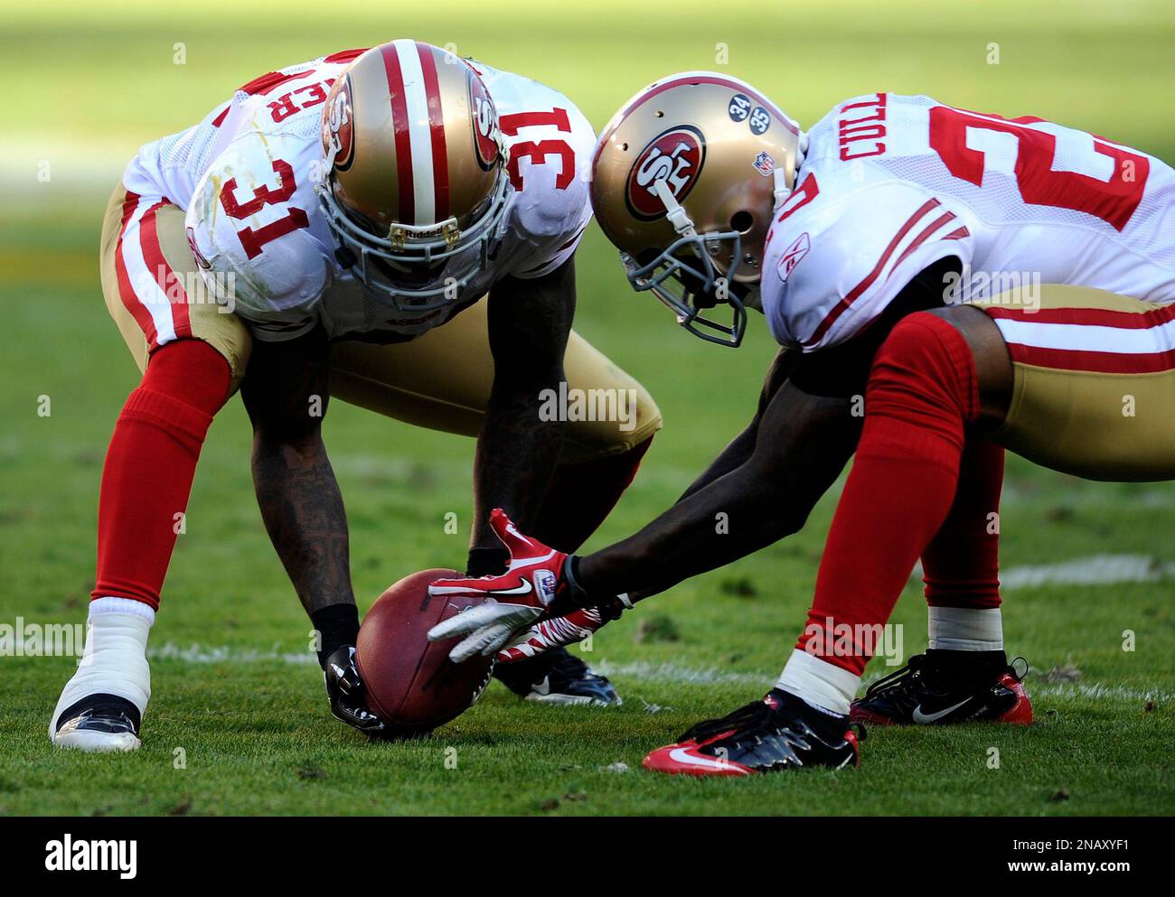 San Francisco 49ers strong safety Donte Whitner, left, recovers a ...