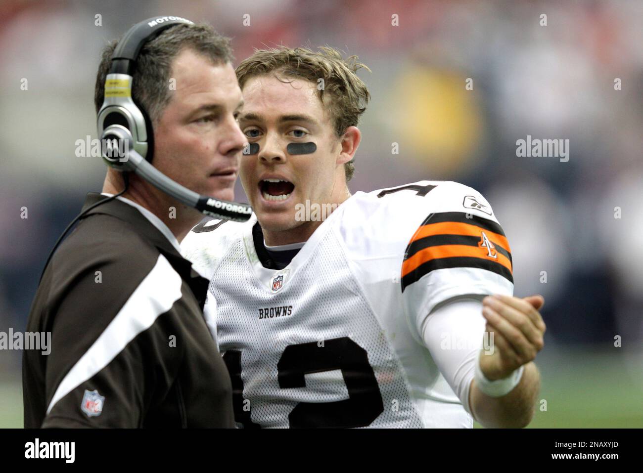 Cleveland Browns quarterback Colt McCoy (12) talks with head coach Pat ...