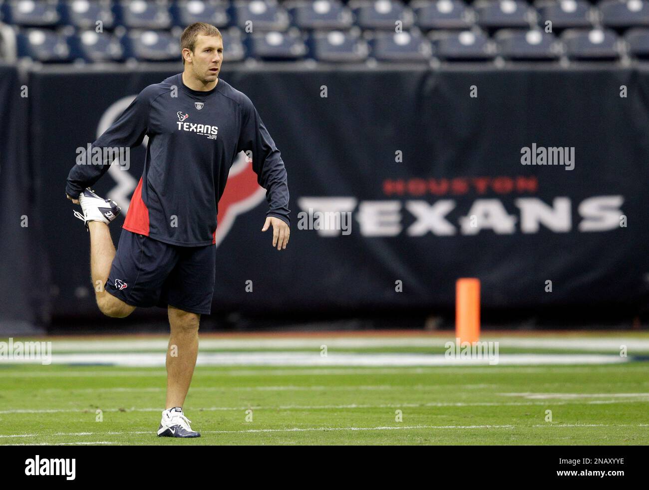 Houston Texans tight end Owen Daniels stretches before an NFL football ...