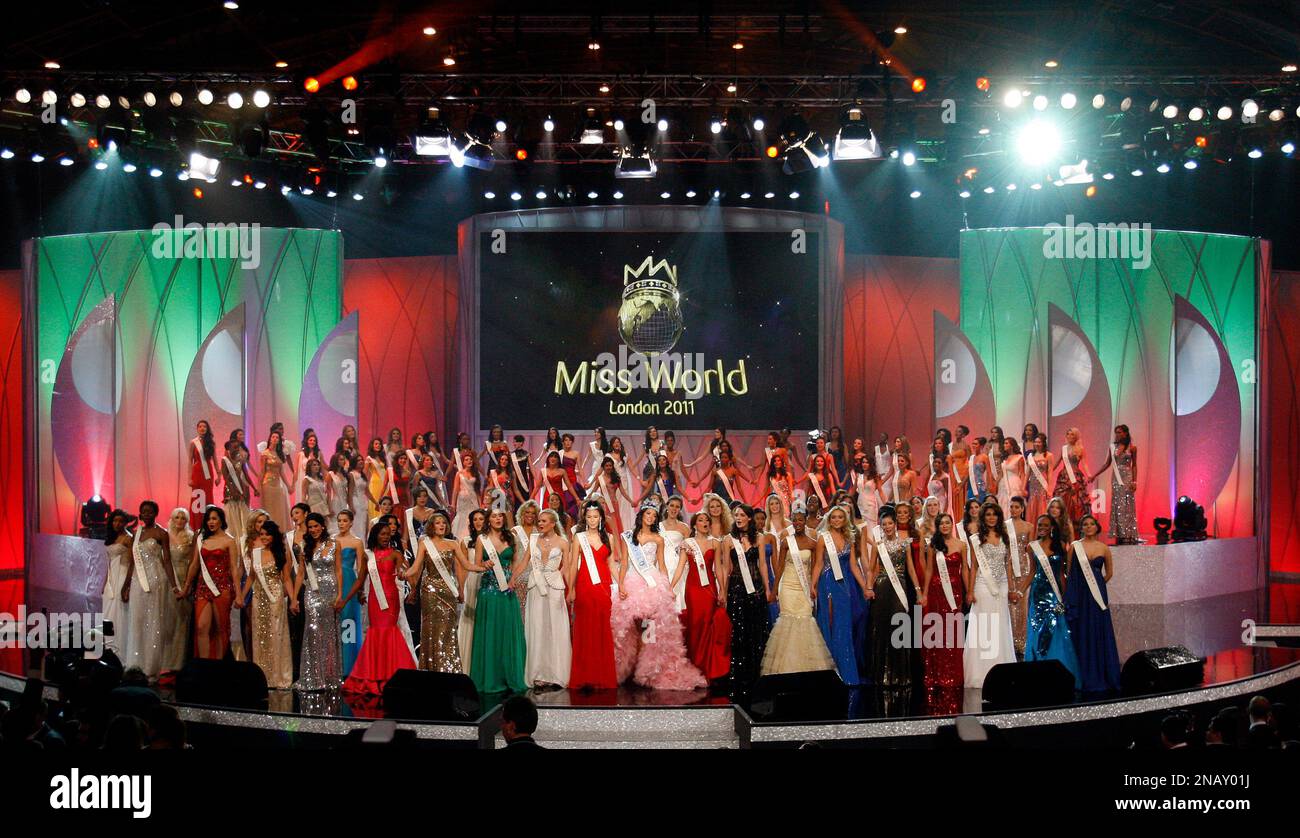 Miss Venezuela Ivian Sarcos, center, sings on stage with her fellow ...