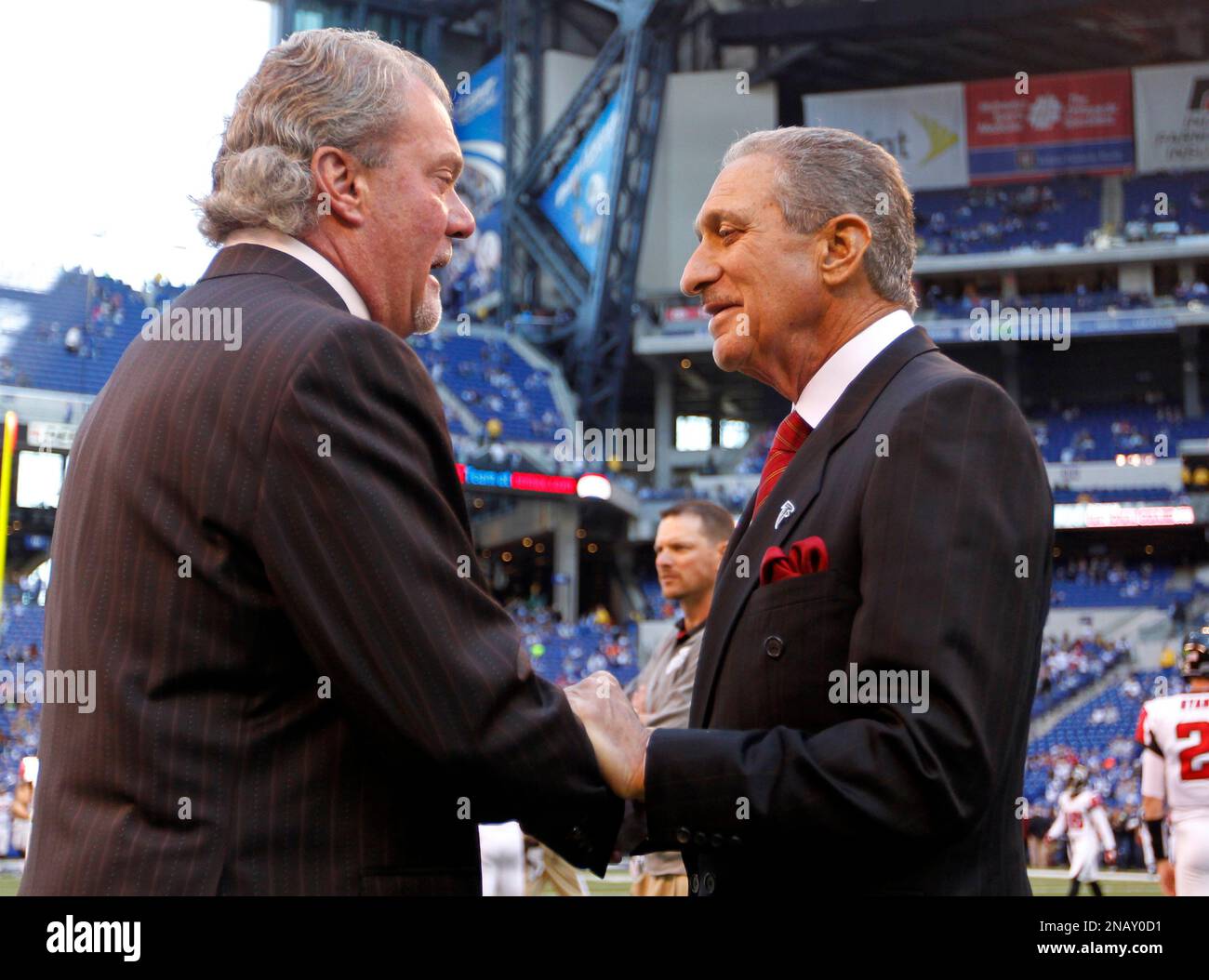 Indianapolis Colts owner Jim Irsay, left, talks to Atlanta Falcons ...