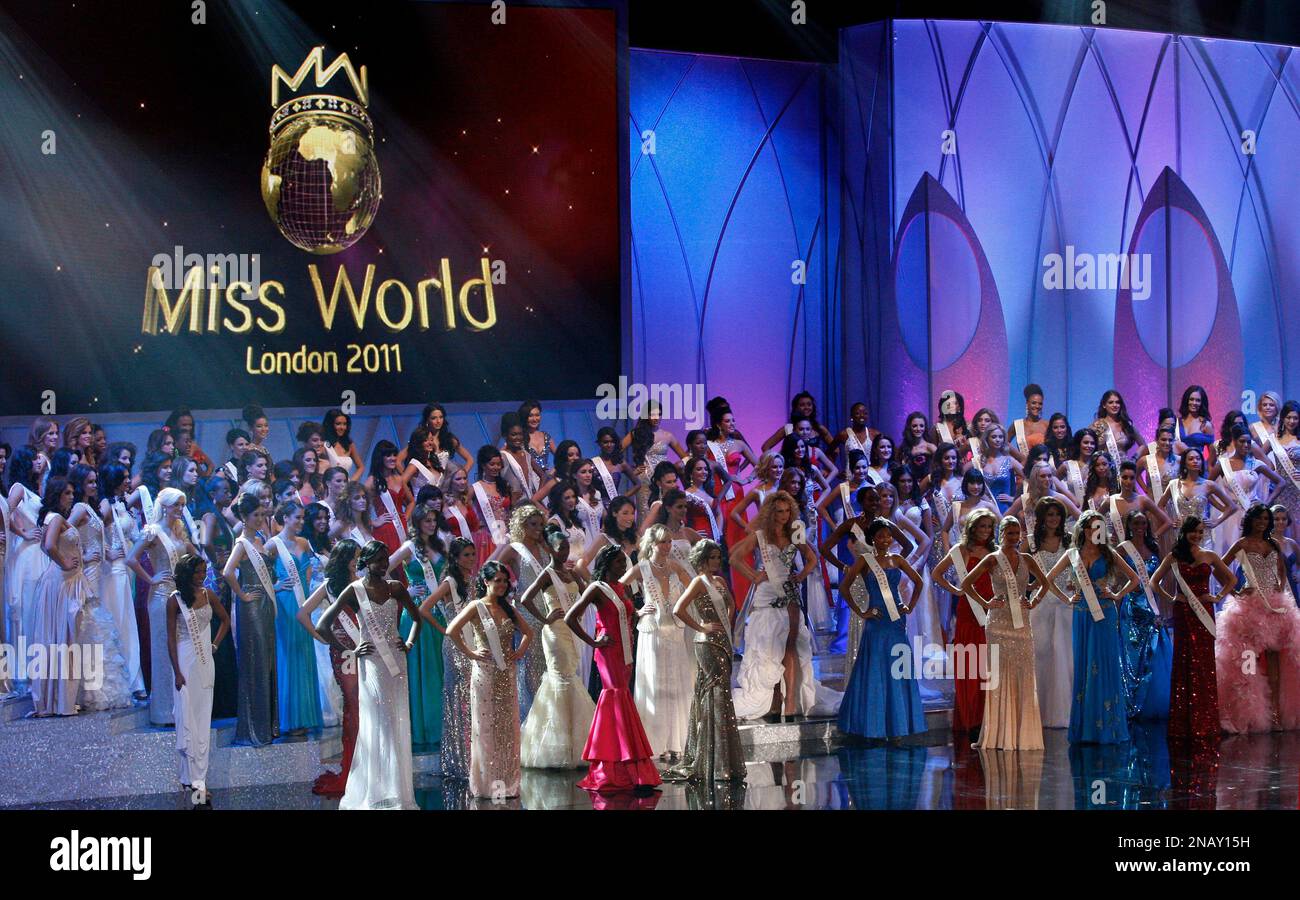 Contestants stand on stage at the 60th Miss World competition at Earls ...