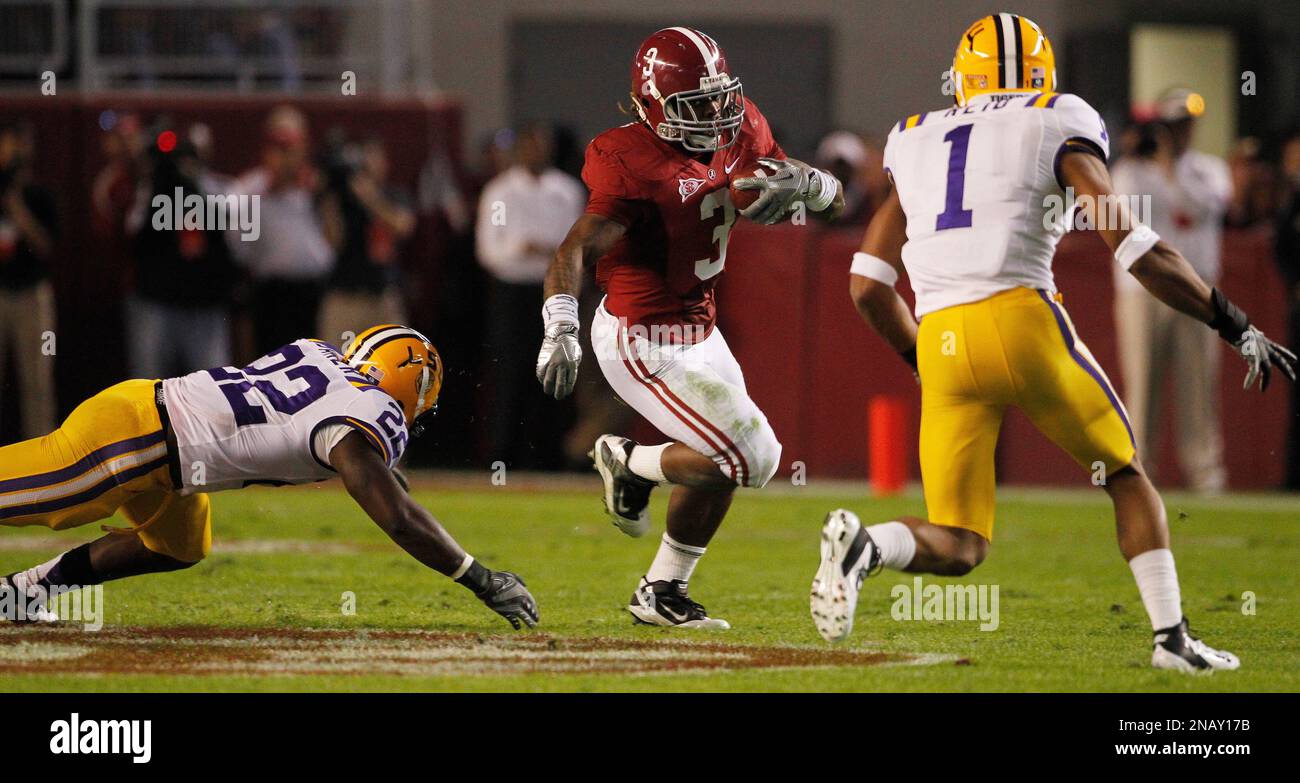 Alabama running back Trent Richardson (3) rushes for yardage as LSU ...