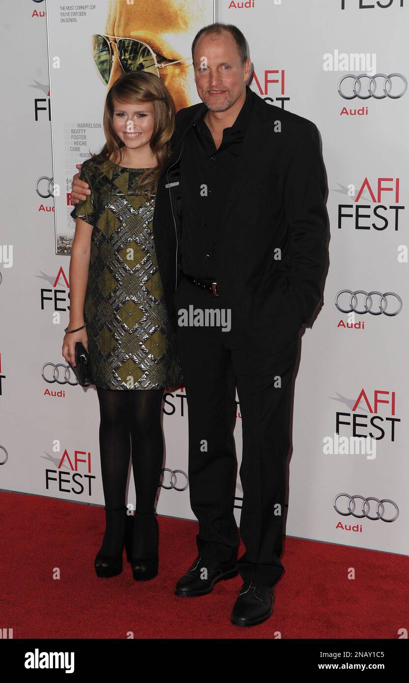 Sammy Boyarsky, at left and Woody Harrelson arrives at the AFI premiere ...