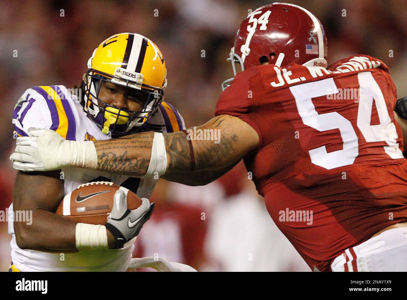 LSU running back Spencer Ware (11) tries to get past Alabama defensive ...