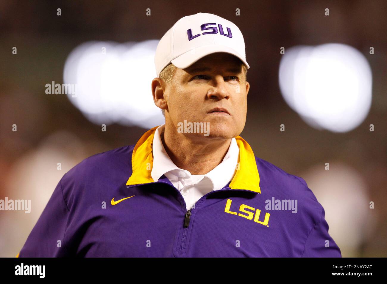 LSU head coach Les Miles walks on the turf before the first half of an ...