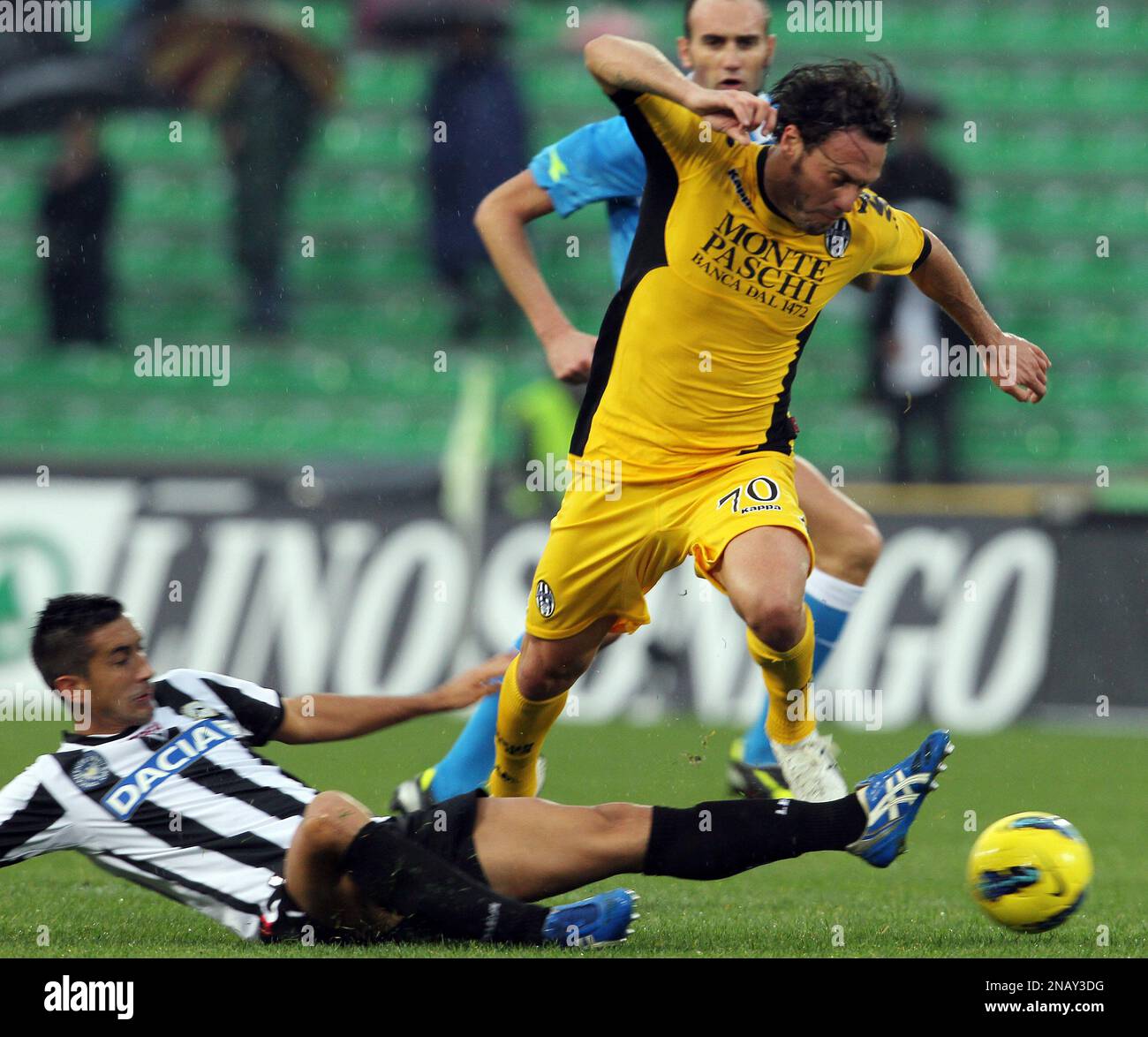 Siena's Gaetano D'Agostino, left, and Udinese's Giampiero Pinzi fight ...