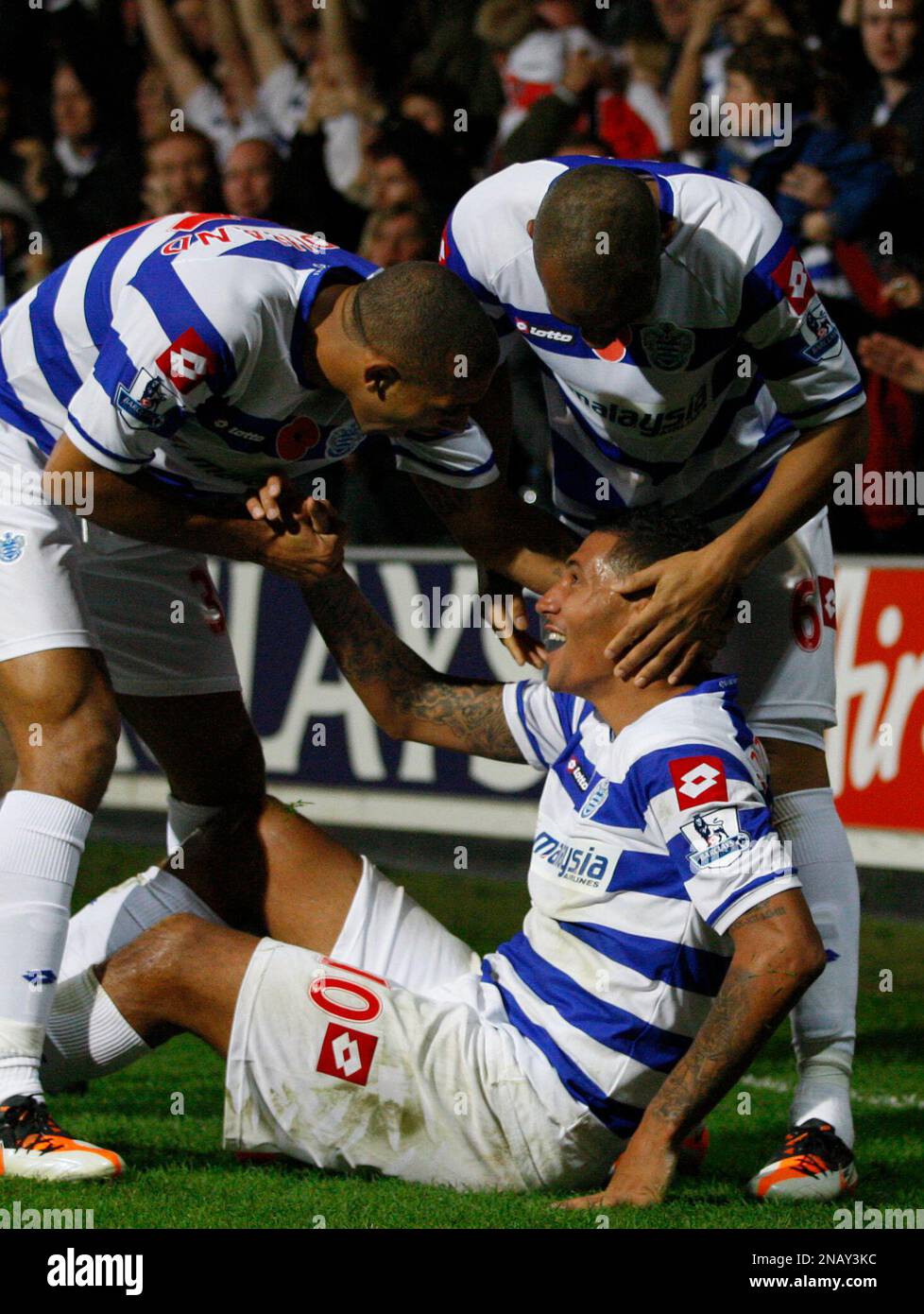 Queens Park Rangers' Jay Bothroyd, on ground, celebrates after scoring ...