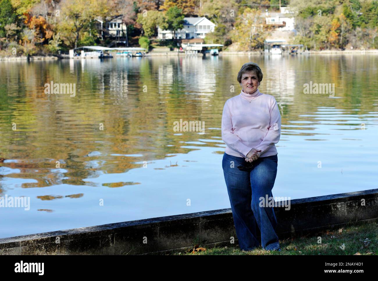 In this Oct. 31, 2011 photo, Patsy Riley stands next to the seawall ...