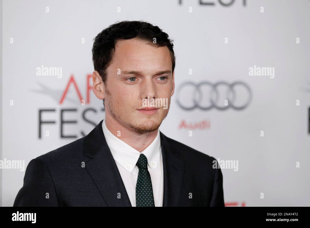 Actor Anton Yelchin poses for photographers after the Young Hollywood ...