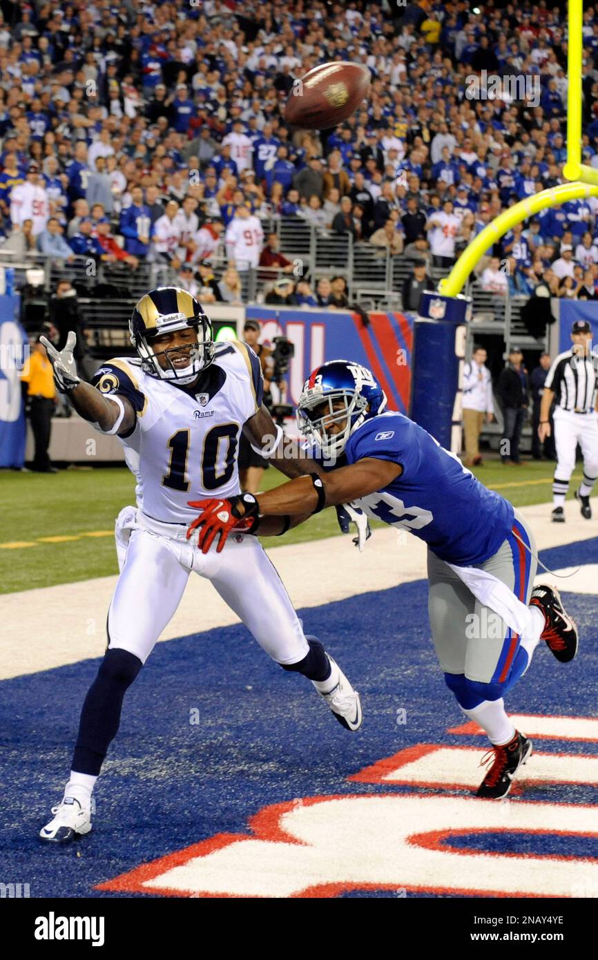 St. Louis Rams wide receiver Mike Sims-Walker cannot catch a pass as ...