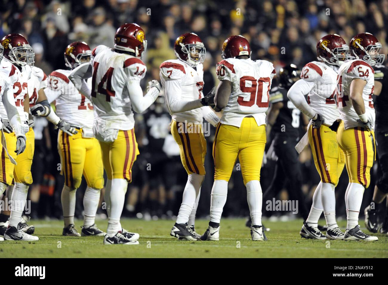 USC safety T.J. McDonald (7) talks with teammatesduring an NCAA ...