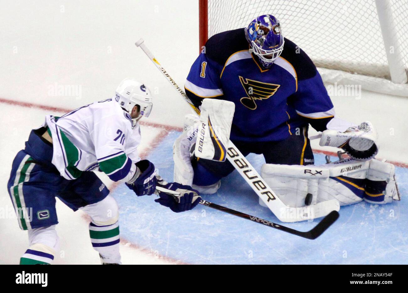 St. Louis Blues goalie Brian Elliott makes a save on a shot by ...