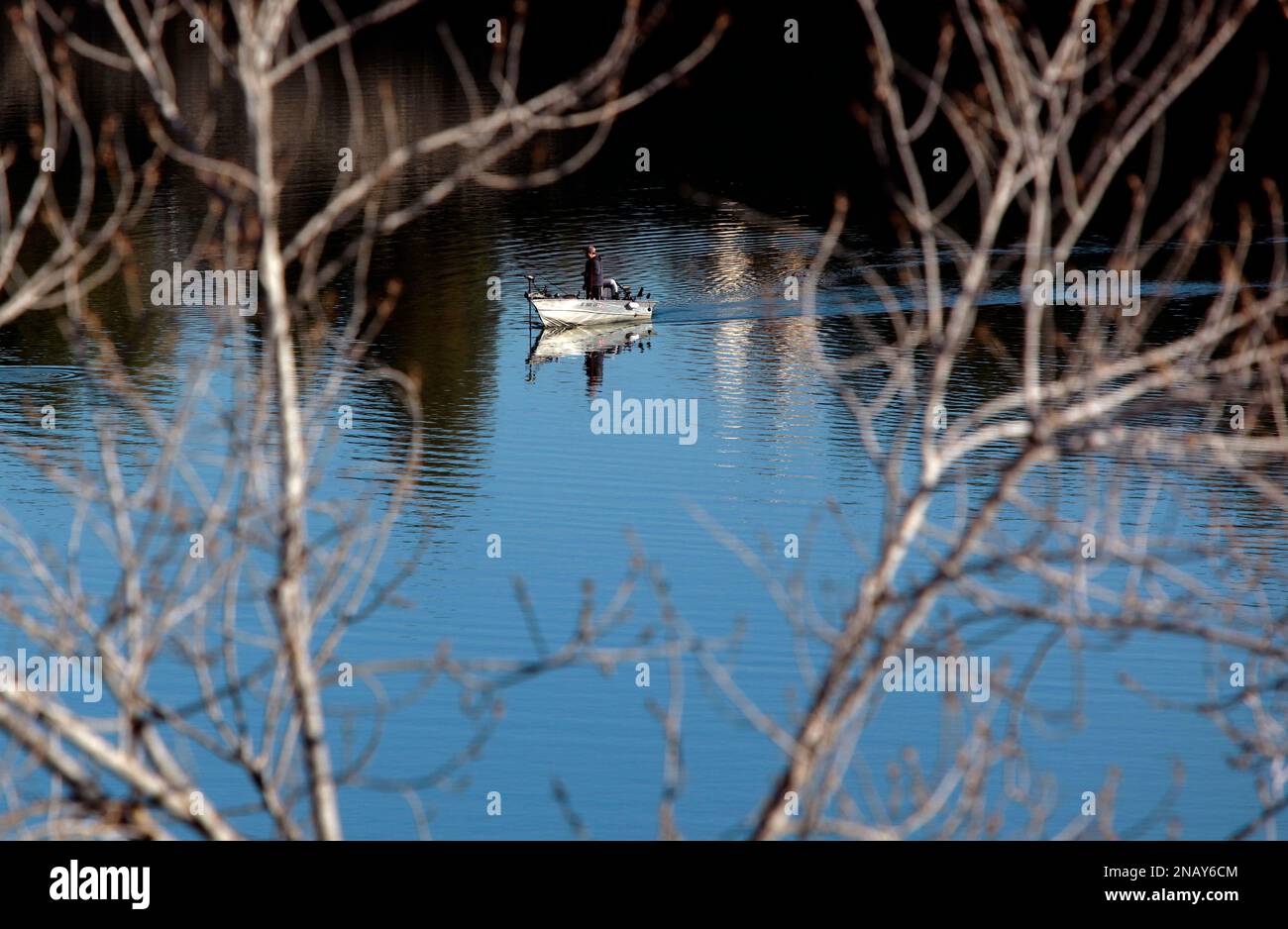 Fishing on the still waters of Shadow cliffs regional park in ...