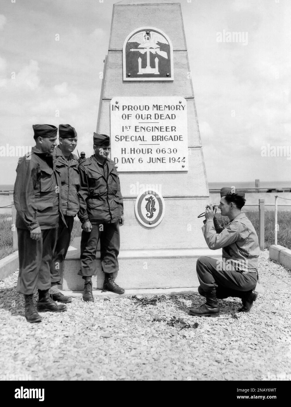 Four American combat engineers visit the spot at Utah Beach, Normandy ...