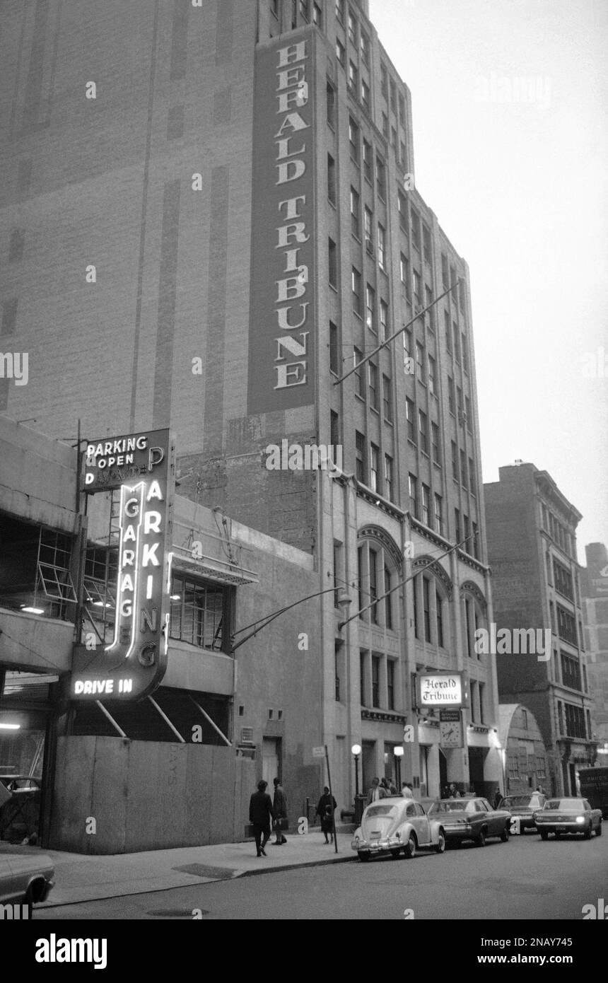 The New York Herald Tribune building is shown, April 22, 1966, at dusk ...