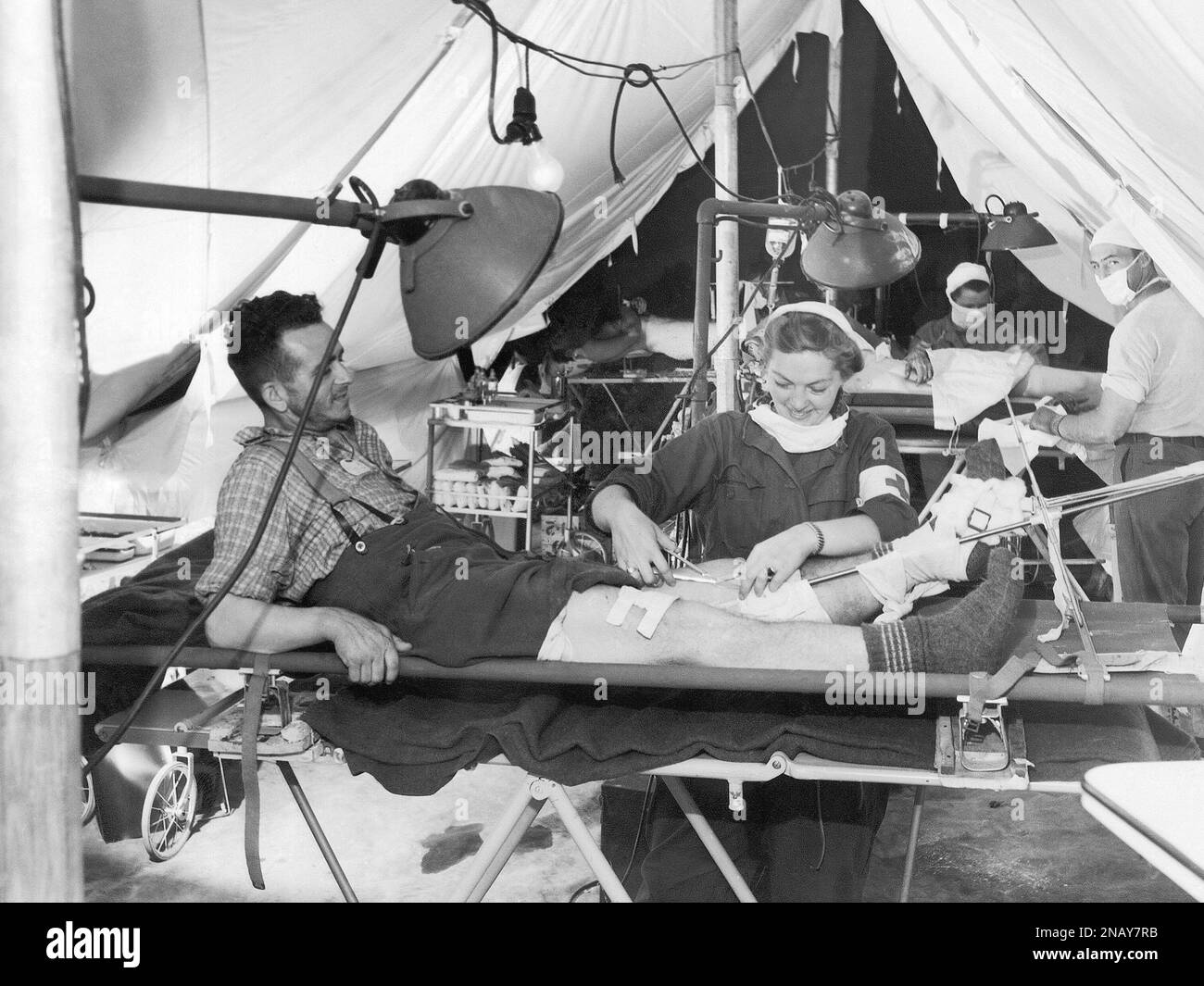 Lieutenant Mildred MacDonald of Collingswood, New Jersey, dresses the ...