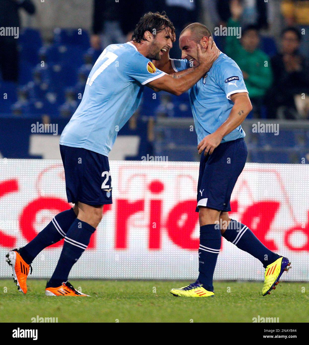 Lazio midfielder Cristian Brocchi, right, celebrates with his teammate ...