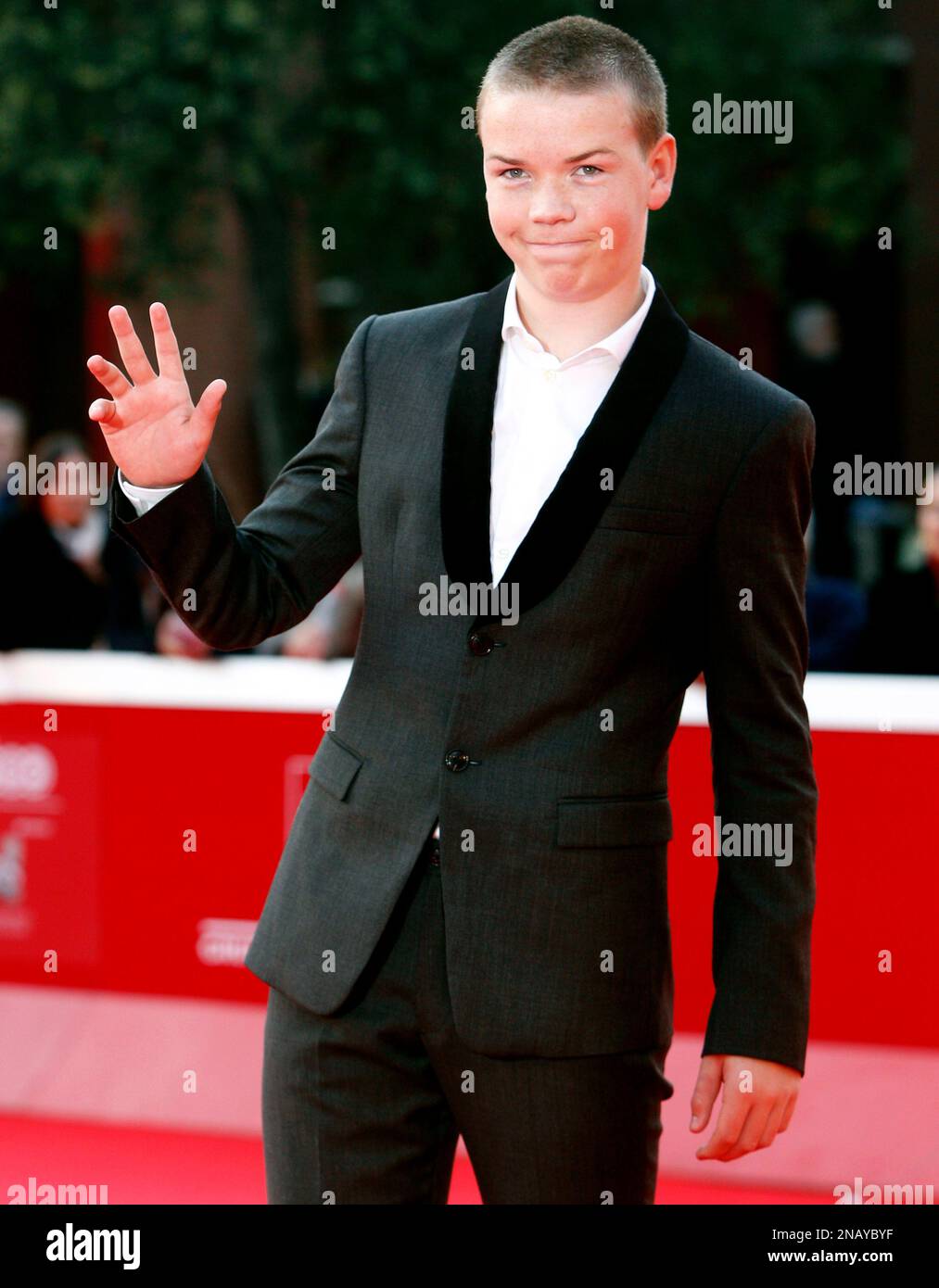 British actor Will Poulter waves at photographer during the ...