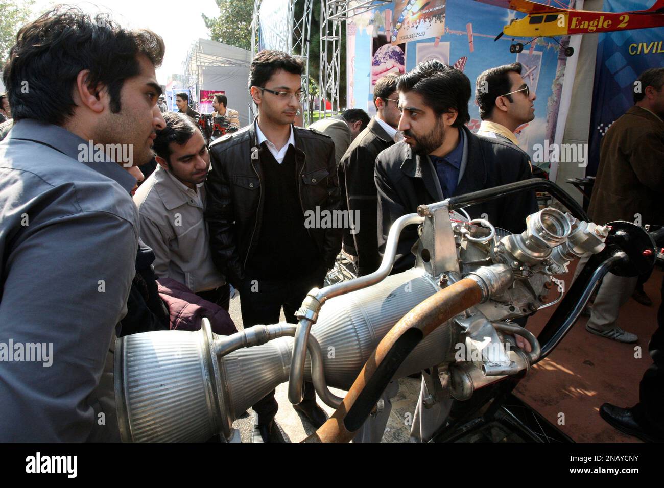 Iranian Fardad Eizadi, right, explains about the engine of a Sam-2 ...