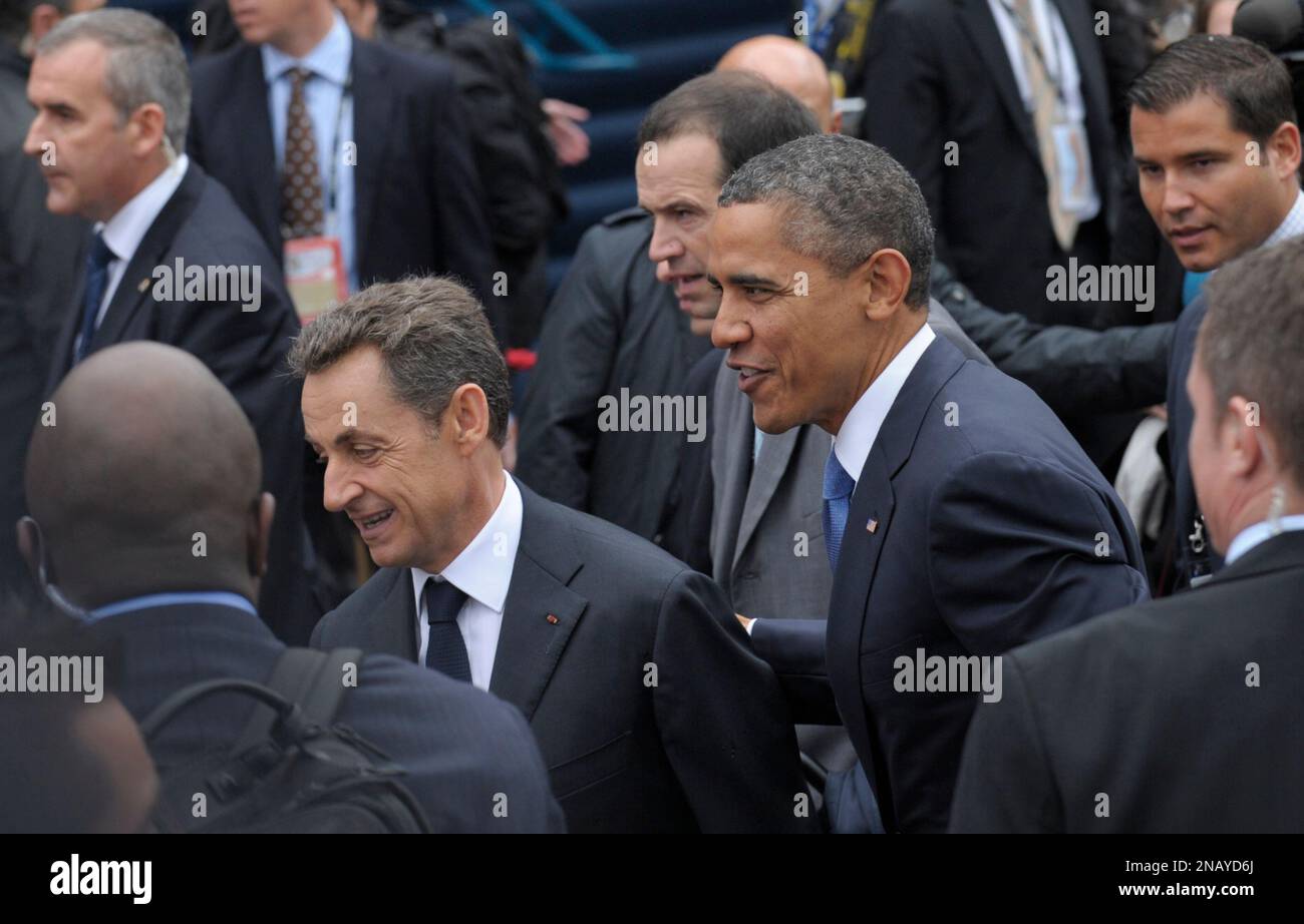 U.S. President Barack Obama, centre left, walks with French President ...