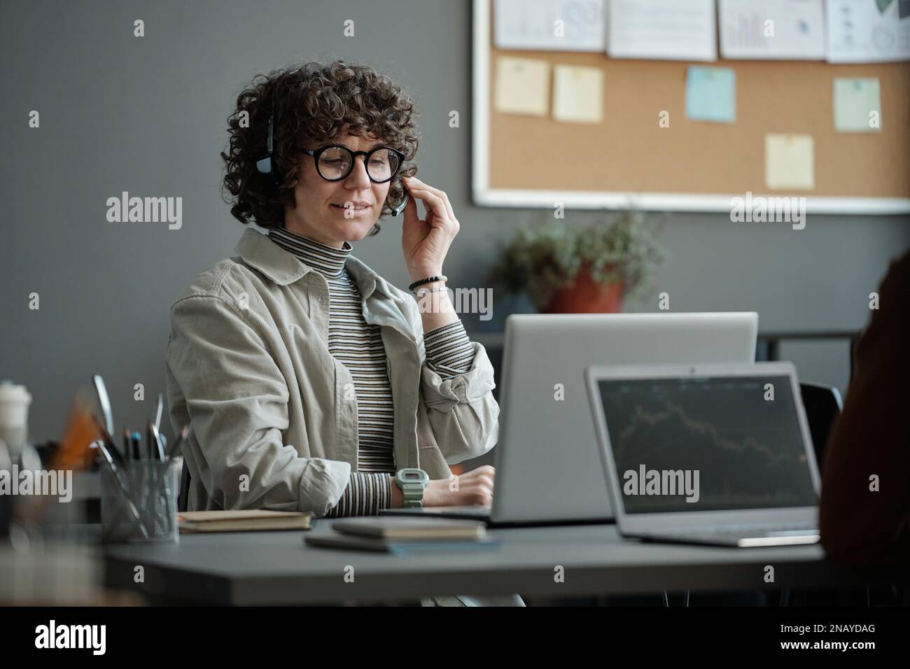 Technical call center manager talking hi-res stock photography and ...