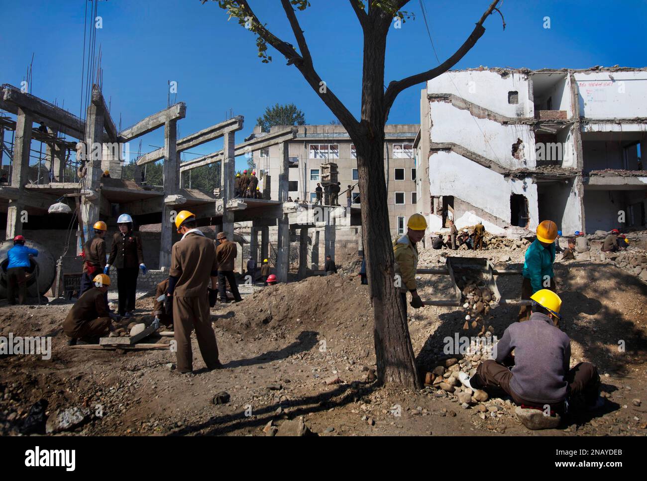 In this Tuesday Oct. 11, 2011 photo, North Korean construction workers ...