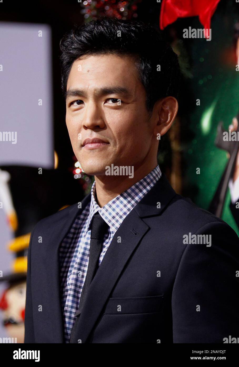 Cast member John Cho arrives the premiere of "A Very Harold and Kumar ...