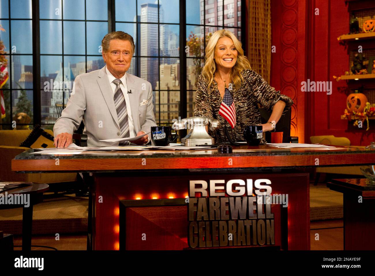 Regis Philbin and Kelly Ripa appear on set during the taping of "Live ...