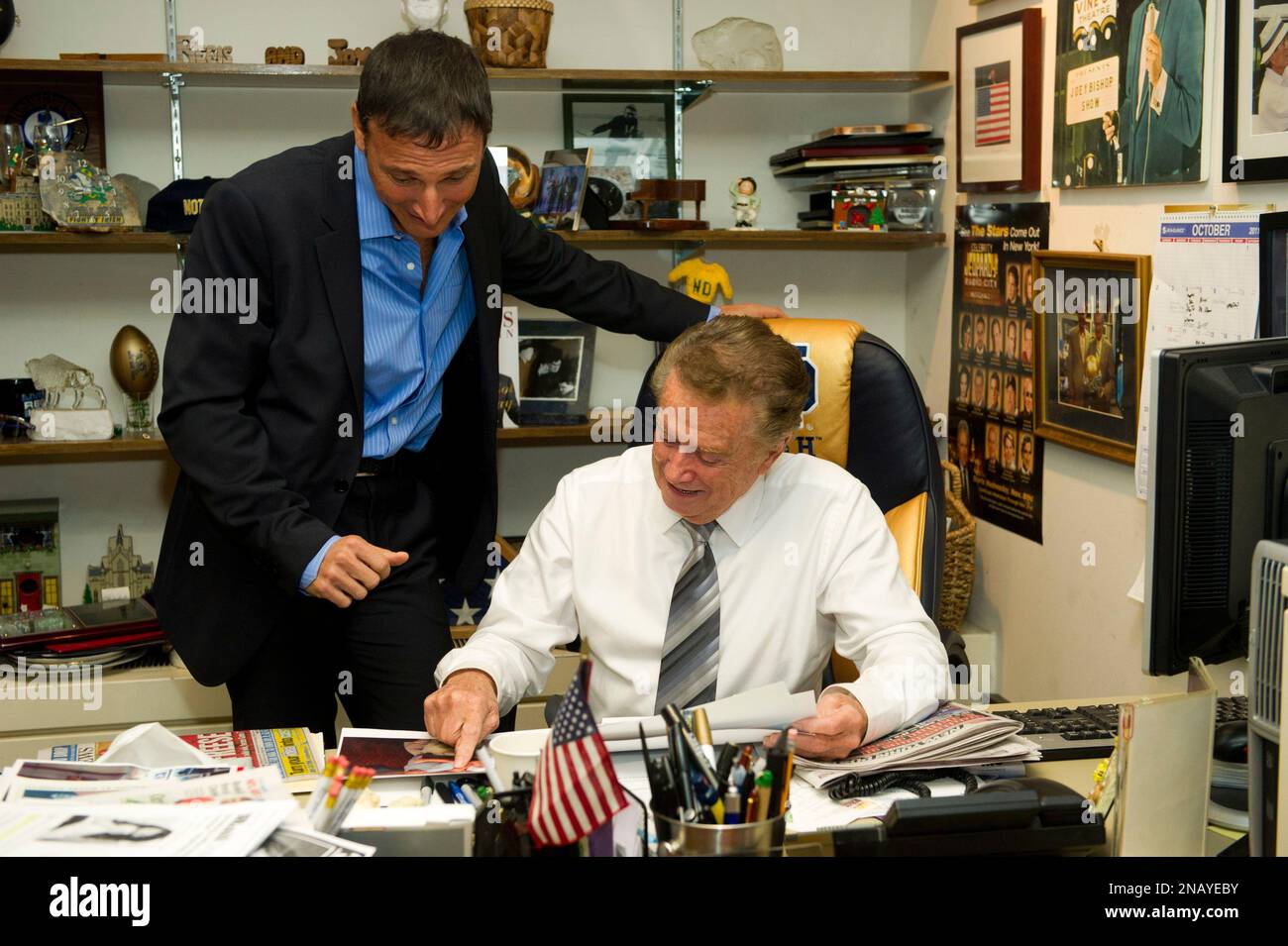 Regis Philbin, right, and producer Michael Gelman go over show prep in ...