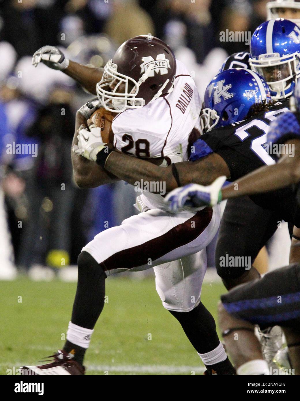 Mississippi State running back Vick Ballard (28) works to get away from ...