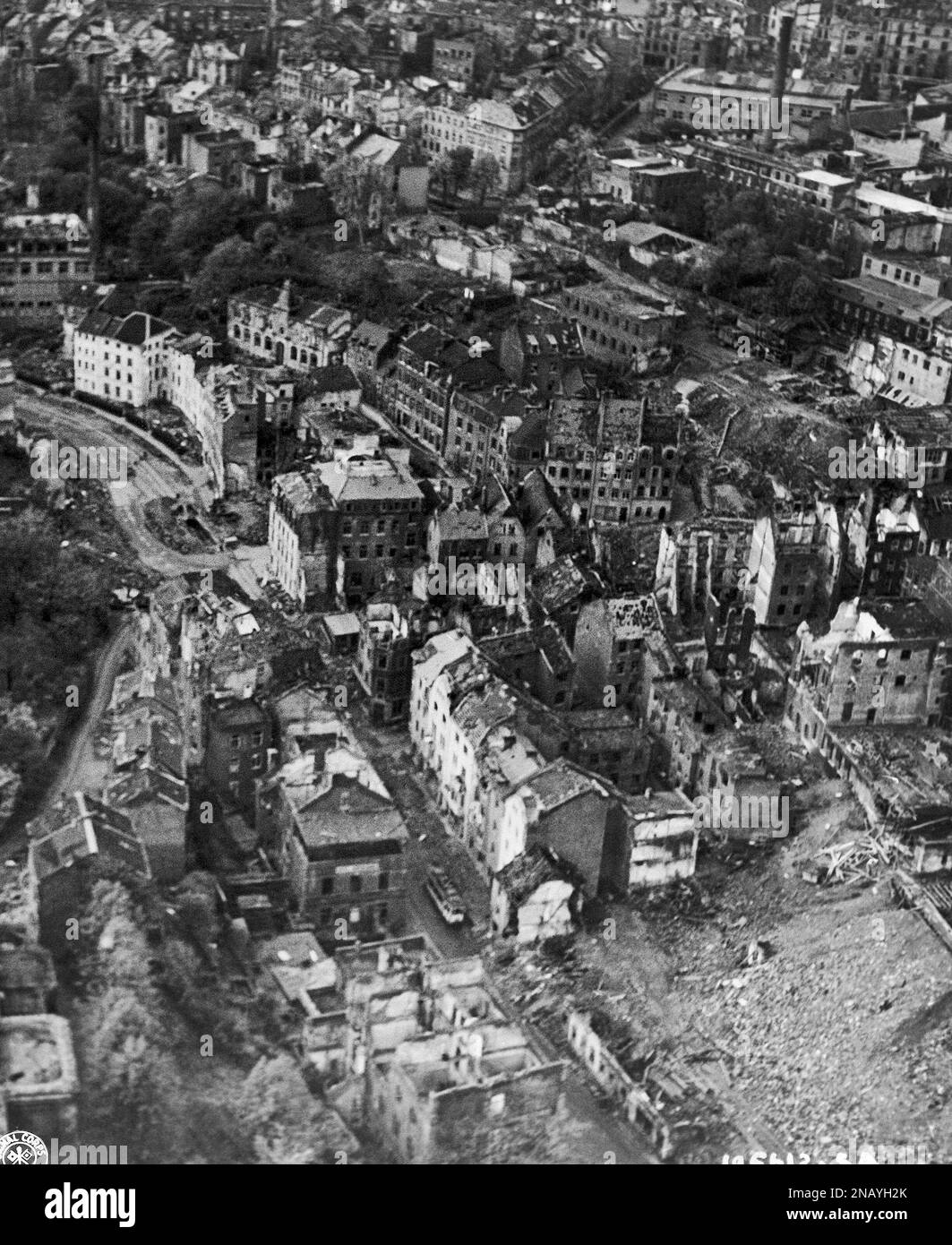 Destroyed and gutted buildings line the rubble-filled streets of the ...