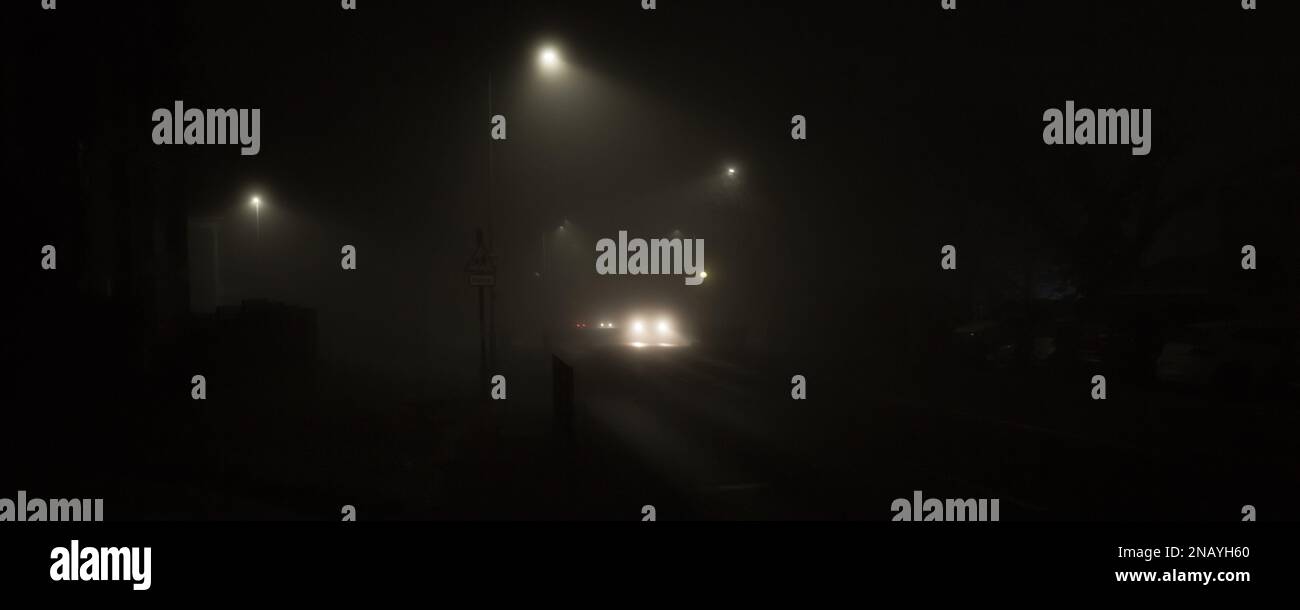 Dark Street in Britain on a foggy night Stock Photo - Alamy