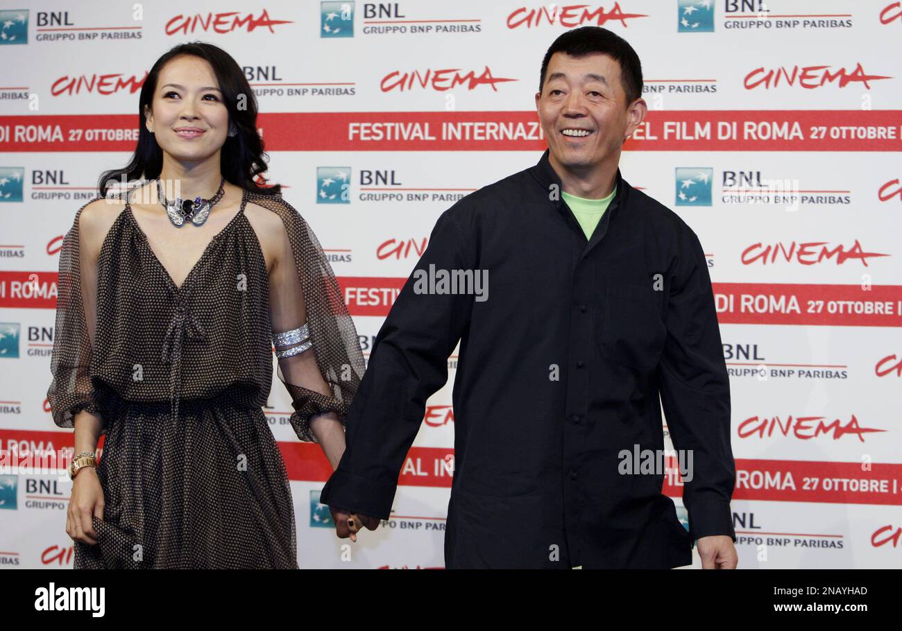Chinese director Gu Changwei and actress Zhang Ziyi pose during a ...