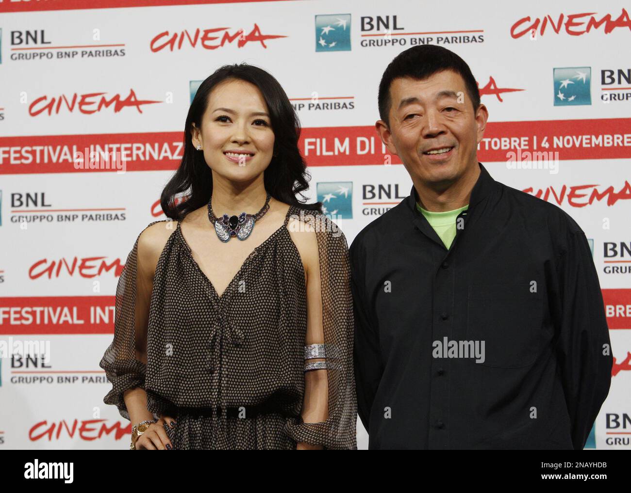 Chinese director Gu Changwei and actress Zhang Ziyi pose during a ...