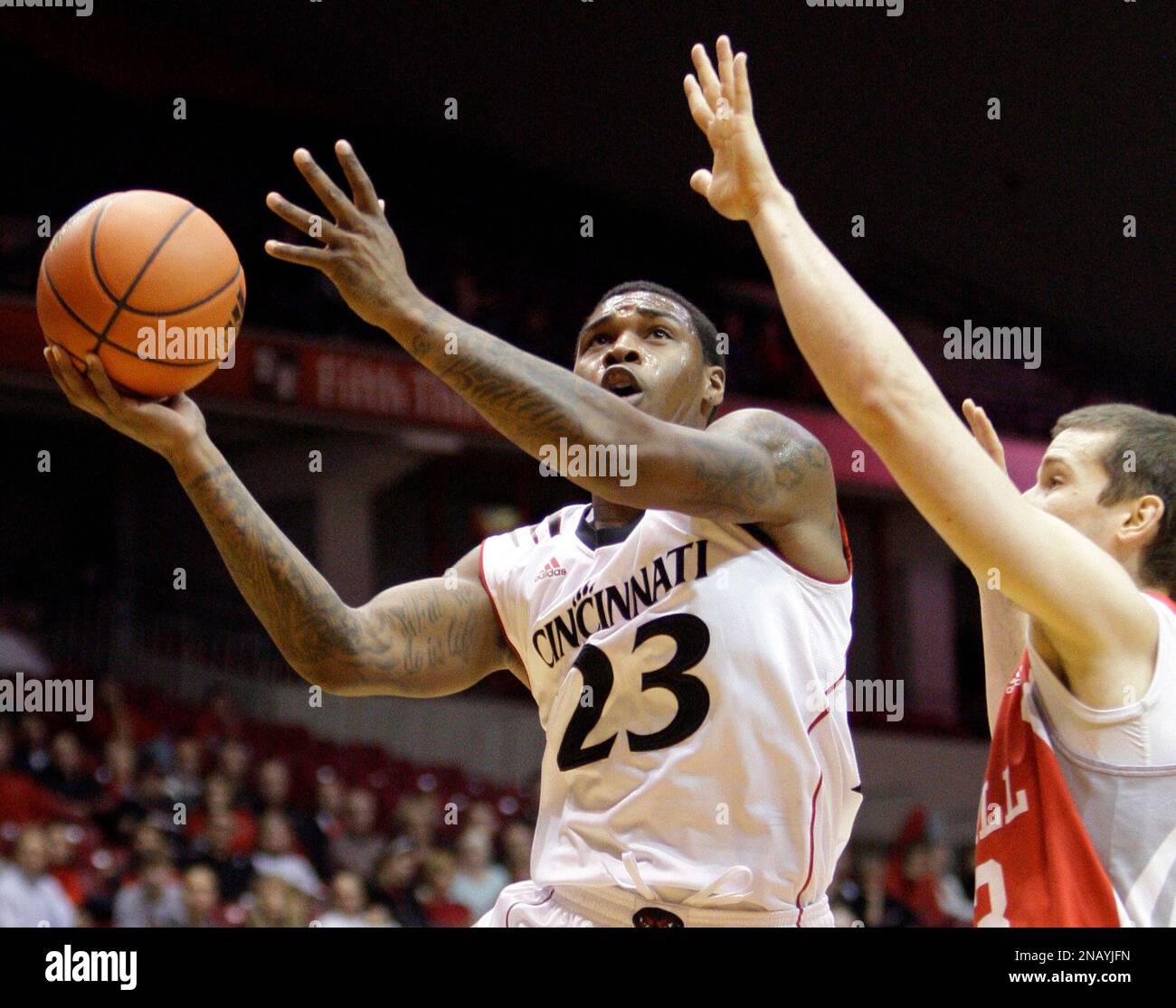 Cincinnati guard Sean Kilpatrick (23) drives against McGill forward ...