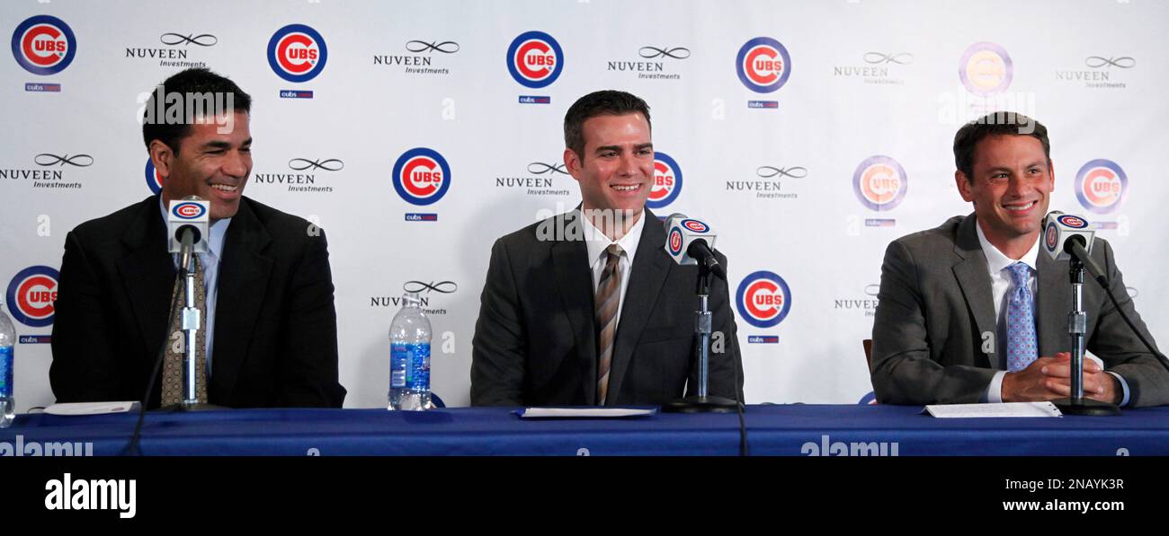 Chicago Cubs president of baseball operations Theo Epstein, center ...