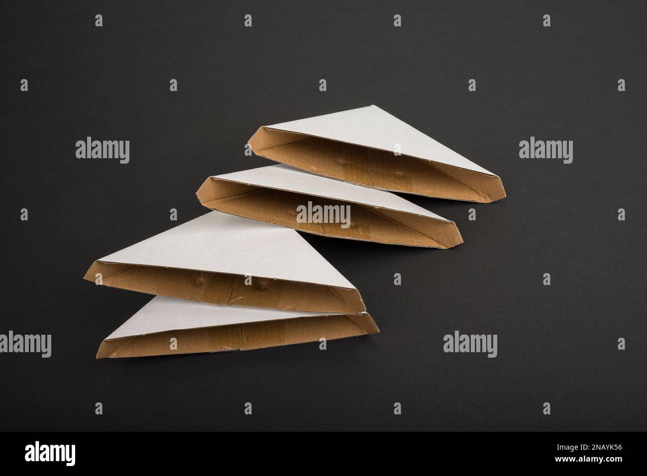 Paper Edge Corner Protector on a black. Protection In Packaging Stock ...