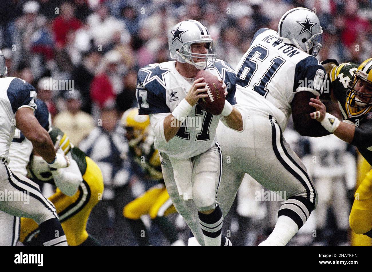 Dallas Cowboys quarterback Jason Garrett looks for a receiver downfield ...