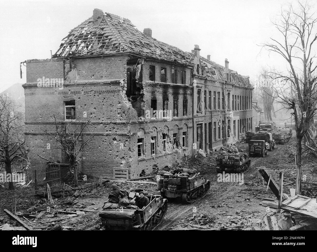 British armor and equipment line the street awaiting the order to move ...
