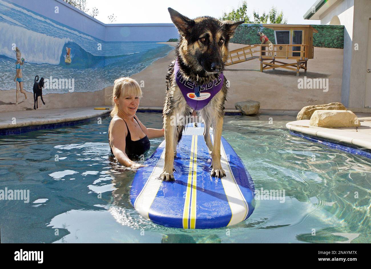 In this Wednesday, Oct. 26, 2011 photo, Mary Kay Benson gives German ...