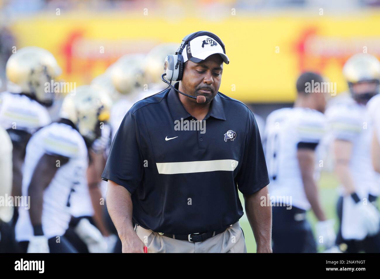 Colorado head coach Jon Embree paces the sidelines during an NCAA ...