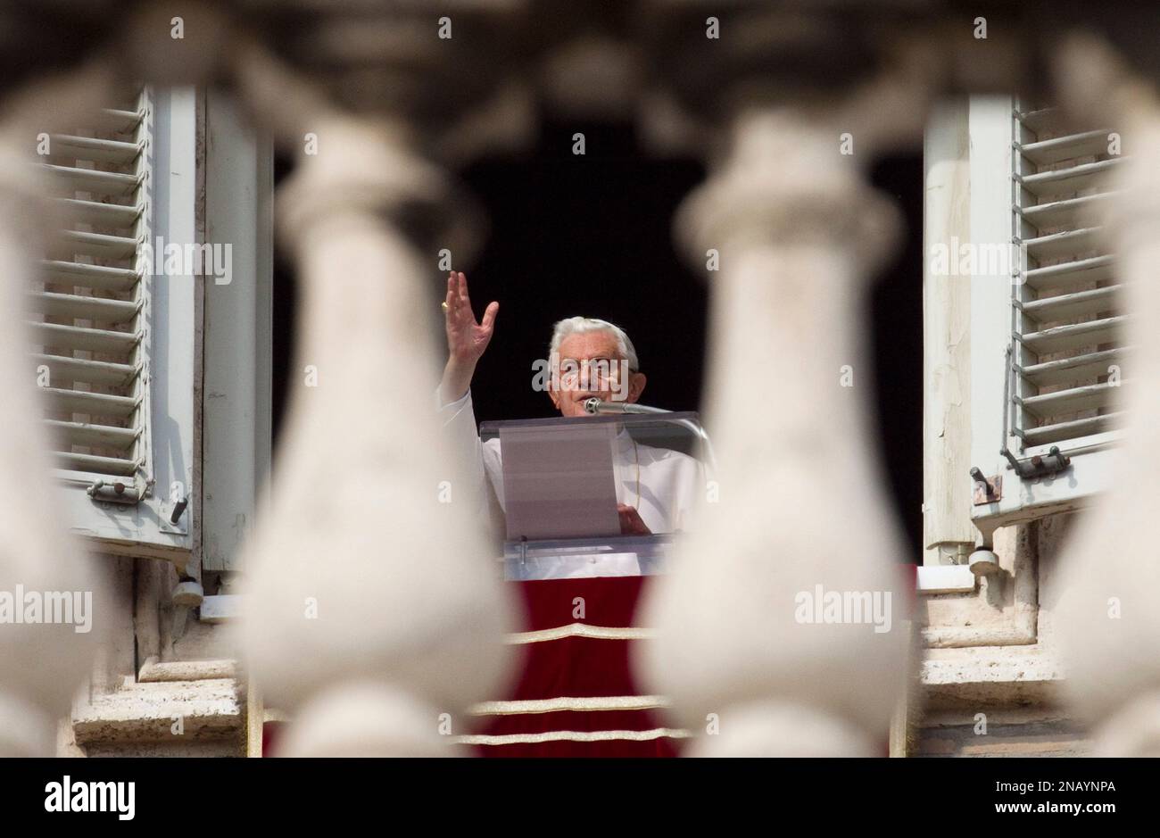 Pope Benedict XVI blesses the faithful during the Angelus noon prayer ...