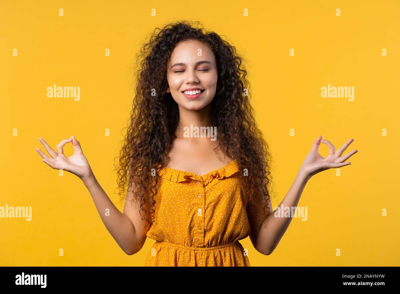 Calm woman relaxing, meditating, refuses stress. Sunny girl breathes ...