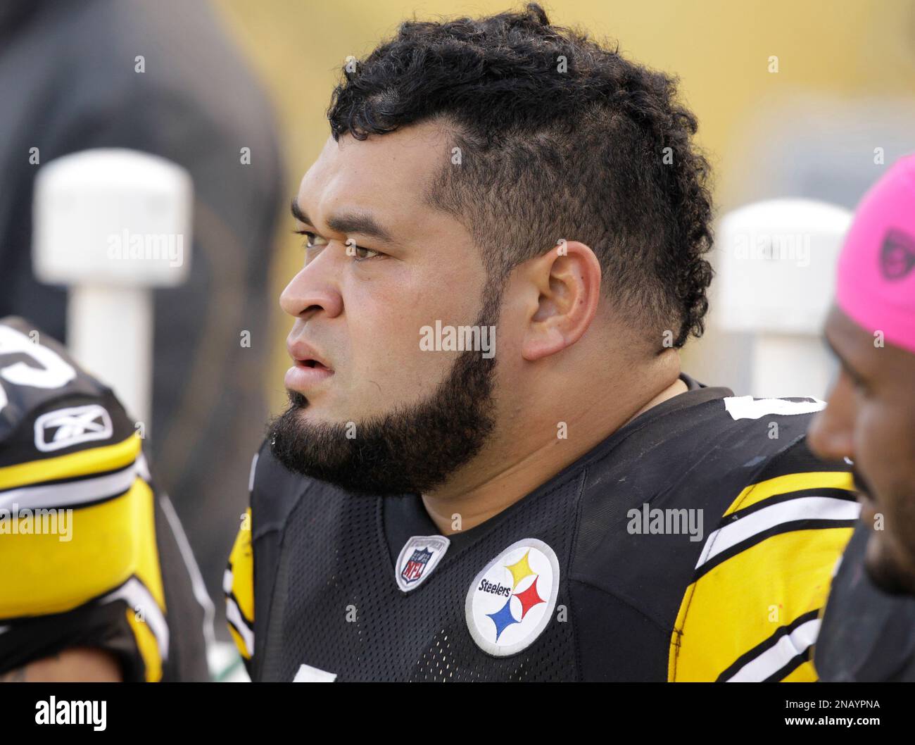Pittsburgh Steelers offensive lineman Chris Kemoeatu sits on the bench ...